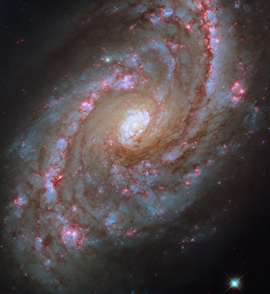 NASA's Hubble Observes Majestic Spiral Galaxy with Starbursts - Hawkdive.com